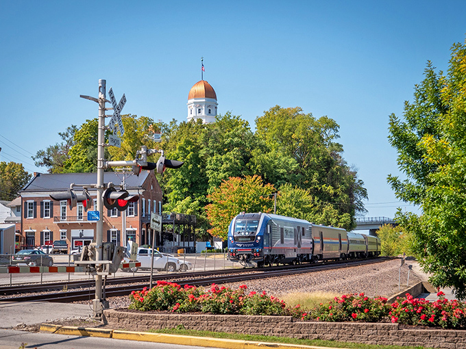 The train still rolls through Hermann, passing beneath the town's golden-domed courthouse &ndash; a Norman Rockwell painting come to life.