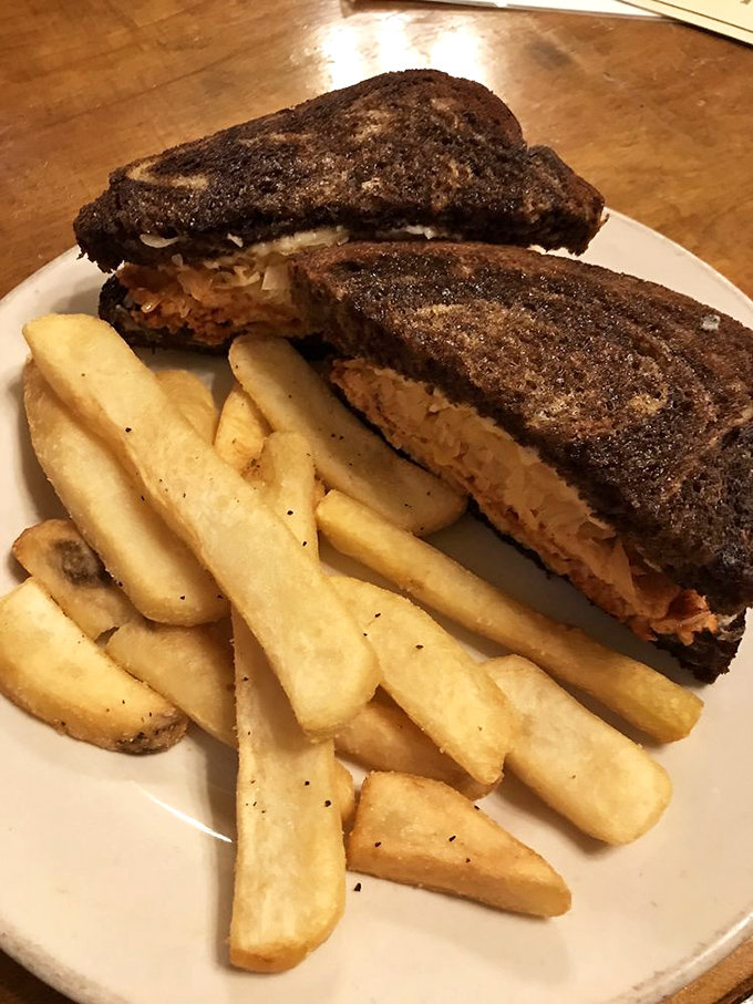 This Reuben doesn't just satisfy hunger&mdash;it creates memories. The perfect marriage of toasty rye, savory filling, and those gloriously crispy fries.
