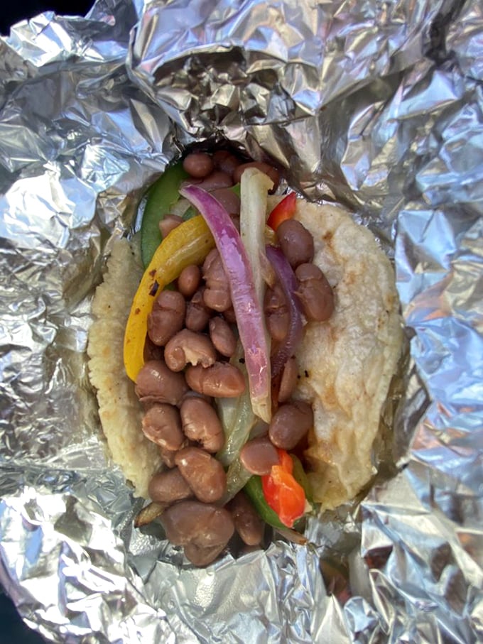 This isn't your average bean taco. It's a colorful fiesta wrapped in a tortilla, where every bite tells you someone in that kitchen really cares.