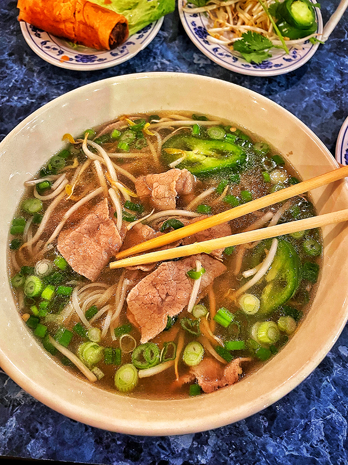 A symphony in a bowl&mdash;tender beef, aromatic broth, and fresh herbs create the kind of pho that makes you forget your table manners.
