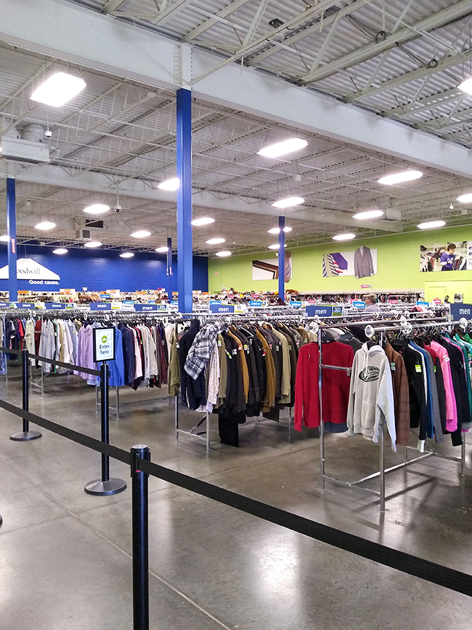 Organized chaos at its finest—racks upon colorful racks creating clothing canyons that practically dare you to explore their depths.