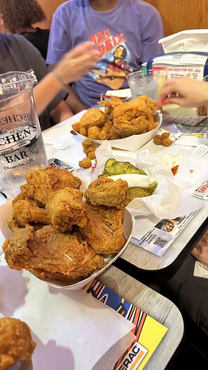 Golden-brown perfection doesn't need fancy plating. This whole fried chicken with pickles and bread has launched a thousand road trips across Oklahoma.