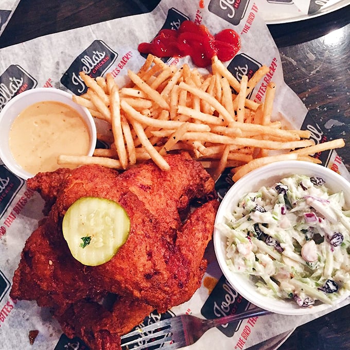 Golden-fried perfection meets pickle precision. This tray isn't just lunch&mdash;it's edible architecture where every crispy, juicy bite delivers on that bold red promise outside.