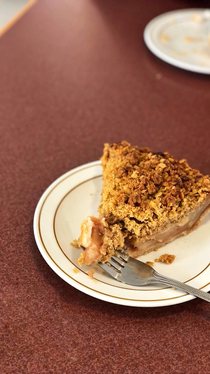 That apple crumble pie isn't just dessert; it's edible architecture&mdash;a perfect balance of structural integrity and melt-in-your-mouth surrender.