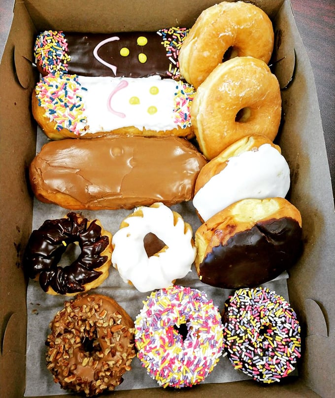 Behold, the box of dreams! From sprinkles to glazed, chocolate to custard-filled—this assortment is like the Avengers of the donut world.