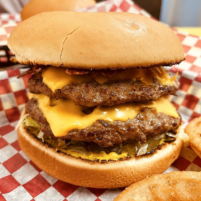 Behold the double cheeseburger in all its glory&mdash;where melted American cheese cascades over beef patties like a yellow waterfall of deliciousness.