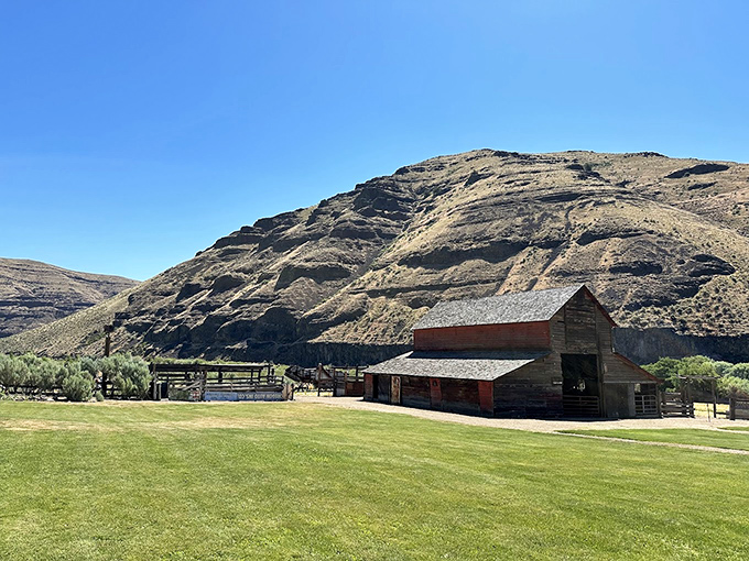 The restored barn stands as a rugged reminder of the land's ranching heritage, now serving as an interpretive center where history meets horizon.