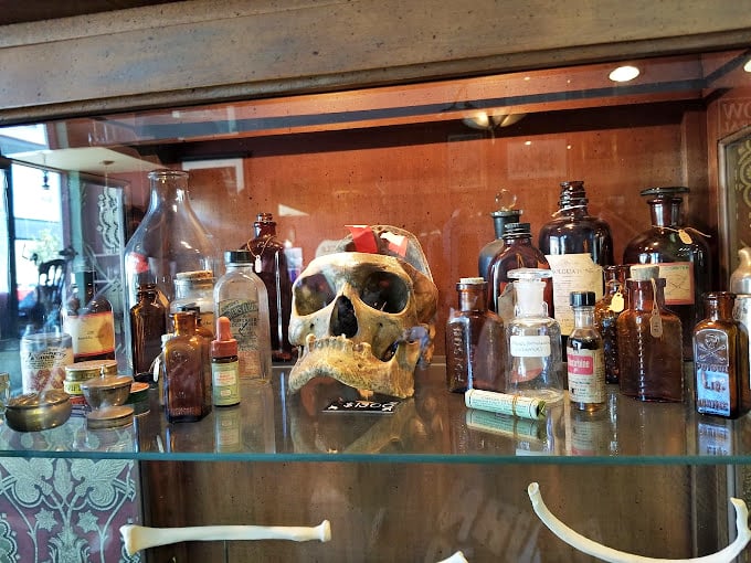 Victorian apothecary meets modern curiosity cabinet. That human skull seems to be judging your medicine cabinet by comparison.