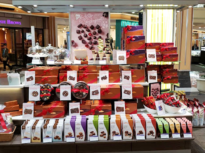 Valentine's Day preparation or Wednesday afternoon pick-me-up? These elegant red boxes promise chocolate diplomacy for any situation requiring sweetness.