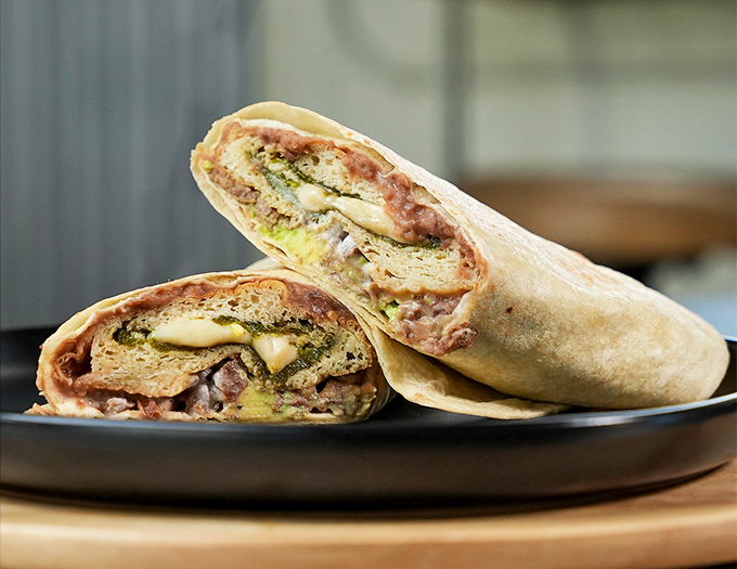 This breakfast burrito doesn't just start your day&mdash;it transforms it. Look at those perfectly melded layers, like a savory sunrise wrapped in a tortilla blanket.