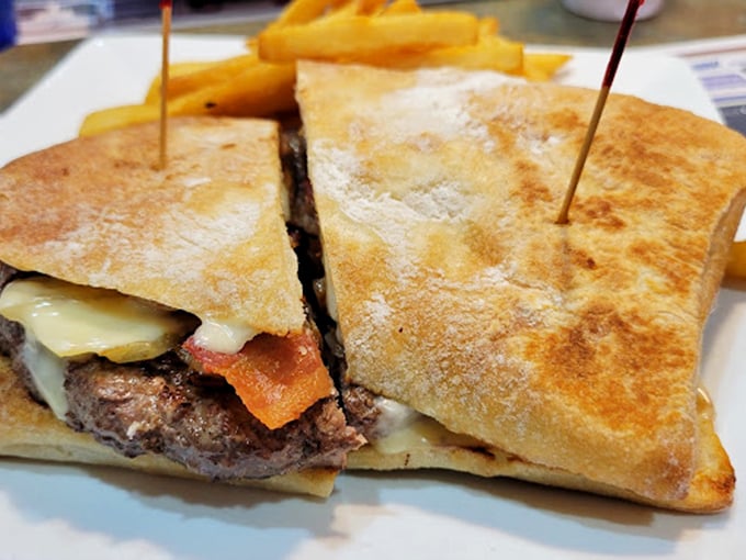 This isn't just a breakfast sandwich; it's architectural genius with layers of bacon, cheese, and beef on perfectly toasted bread. Leonardo da Vinci would've sketched this.