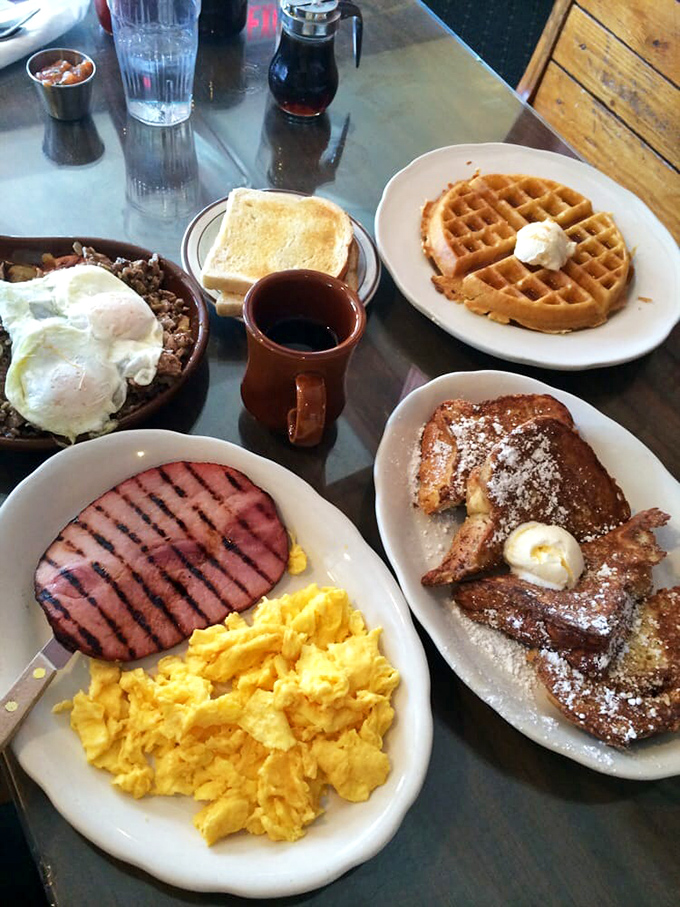Breakfast nirvana achieved! When your table looks like this, you know you've made excellent life choices. The waffle alone deserves its own zip code.