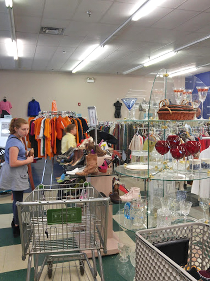 Shopping carts become treasure chests as patrons navigate between glittering glassware and vintage fashion finds, each aisle offering new possibilities.