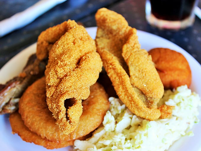 Golden-fried perfection on a plate. This isn't just catfish; it's an Arkansas heirloom served with the respect it deserves.
