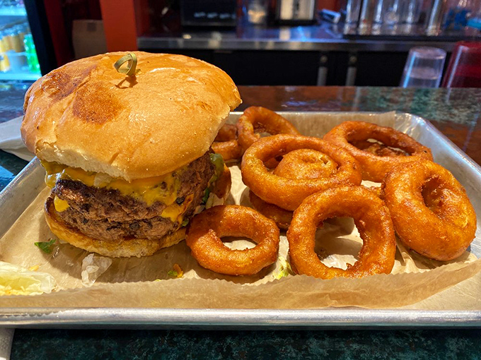 This burger doesn't just satisfy hunger&mdash;it defeats it. Paired with golden onion rings that deserve their own fan club. 
