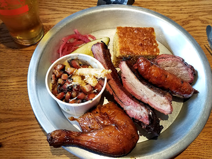 The barbecue sampler plate: where decisions are made for you because choosing between these smoky treasures would be like picking a favorite Beatles song.