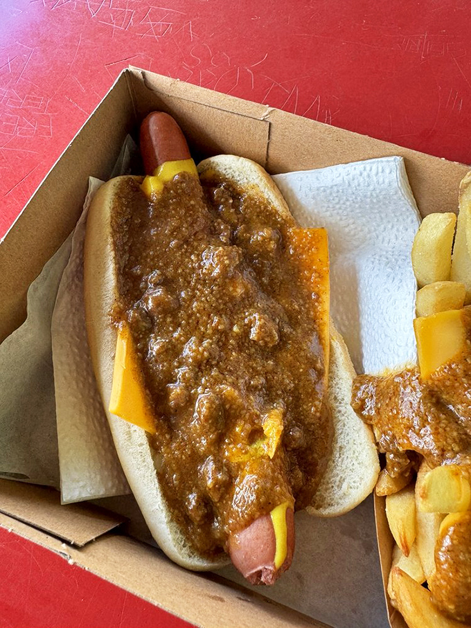 This isn't just a chili dog&mdash;it's a messy masterpiece of beef, cheese, and soul. The kind of food that requires commitment and extra napkins.