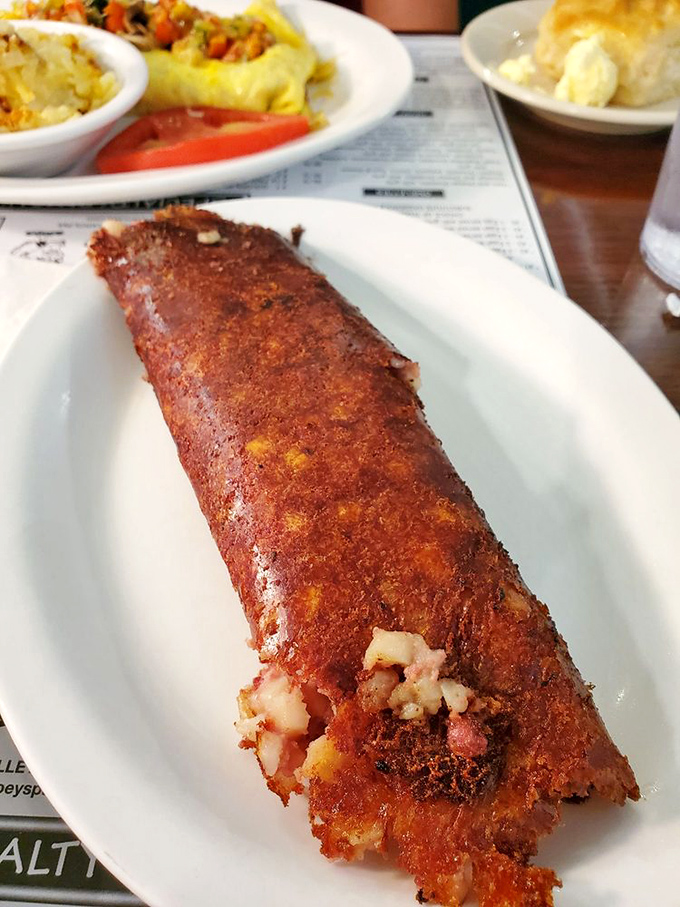 Corned beef hash that would make your Irish grandmother weep with joy. Crispy exterior, tender interior – the breakfast equivalent of hitting the lottery.