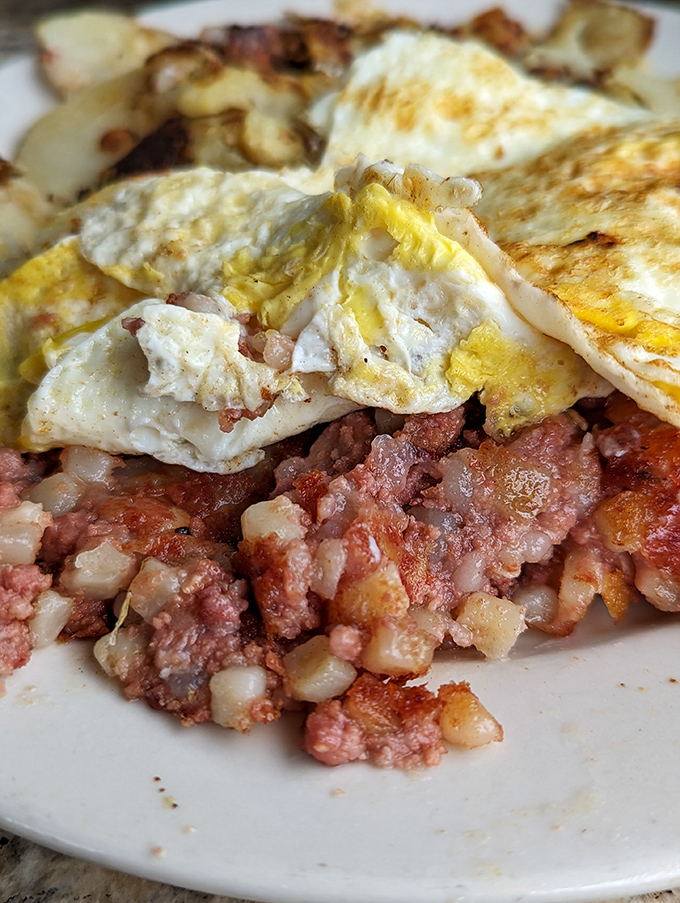 The star of the show: corned beef hash with perfectly runny eggs. This isn't food&mdash;it's edible therapy for whatever ails you.