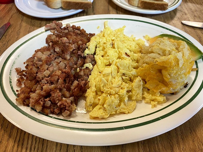 Corned beef hash that doesn't come from a can—a revelation! Paired with eggs that practically glow with freshness and potatoes crisped to perfection.