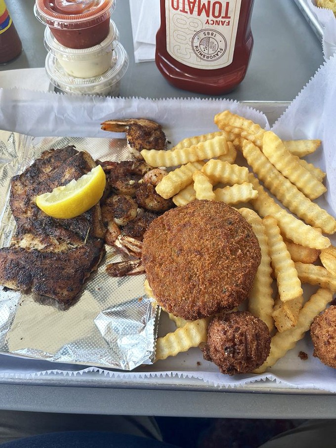 The golden-brown crab cake that launched a thousand return visits. More crab than cake, as nature intended.