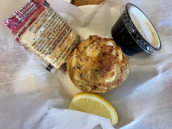 Behold the star attraction: a golden-brown crab cake that's more crab than cake. Like finding the Hope Diamond in a world of cubic zirconia.