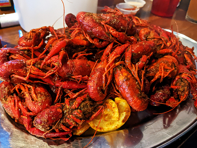 Crawfish so red they could stop traffic. This mountain of spicy mudbugs isn't just dinner&mdash;it's an event that requires both strategy and napkins.