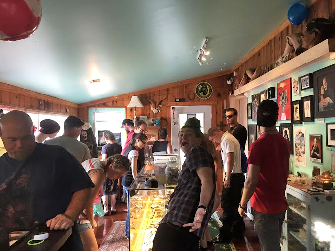 The shop draws curious crowds who come for the oddities but stay for the stories. Everyone's expression says, "Did you see THAT?"