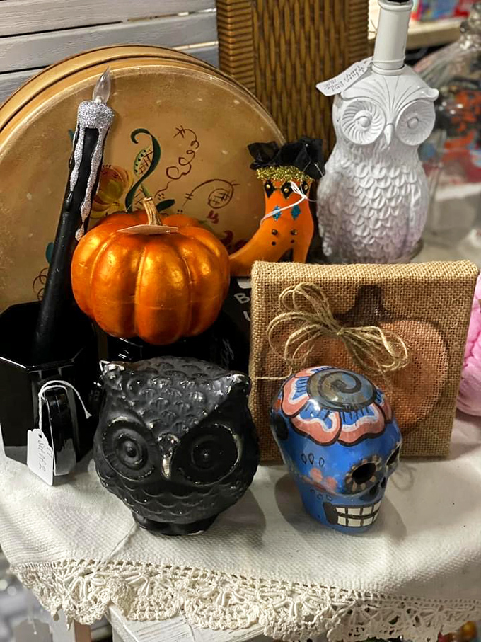 Halloween meets Día de los Muertos in this eclectic display. Those owls aren't judging your purchases—they're jealous they can't go home with you.