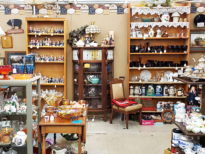 This booth is what happens when your grandma's china cabinet meets a museum curator's dream &mdash; organized chaos of nostalgia that demands closer inspection.