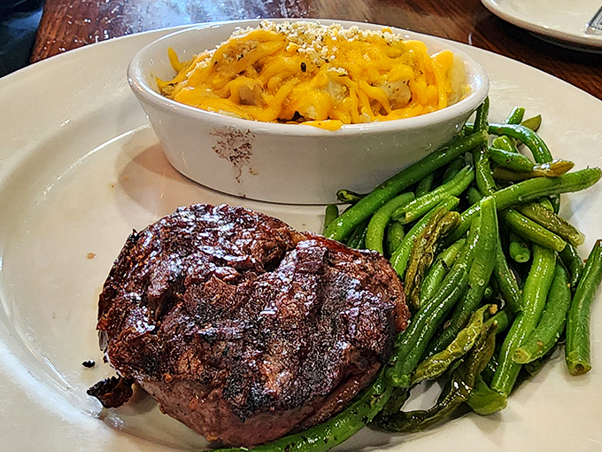 This filet mignon isn't just dinner; it's a masterclass in beef perfection. The mac and cheese and green beans aren't sidekicks&mdash;they're worthy companions.