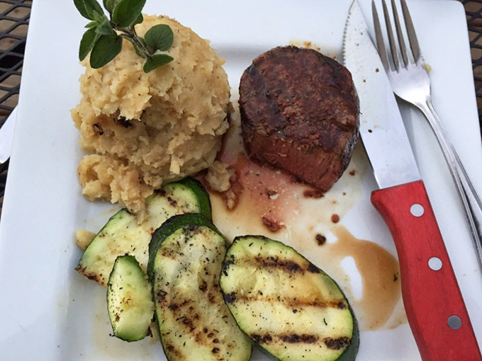 Prime rib that doesn't just sit on the plate&mdash;it commands attention, flanked by mashed potatoes standing at the ready. 