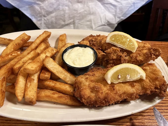The fish and chips that launched a thousand cravings. Golden, crispy, and worth every napkin you'll need afterward. 