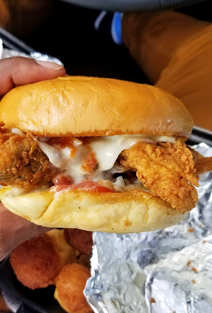 Behold the star of our show&mdash;golden-fried fish nestled in a soft bun with melty cheese and sauce that'll make you question all other sandwiches.