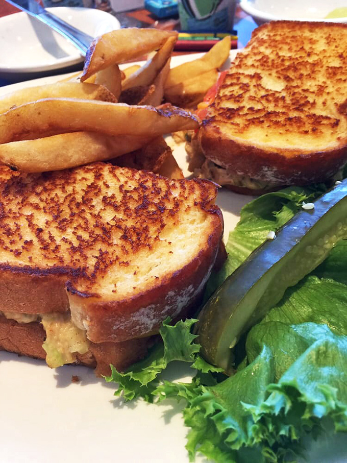 Golden, crispy perfection on a plate. This sandwich isn't just lunch; it's what fish dream of becoming when they grow up.