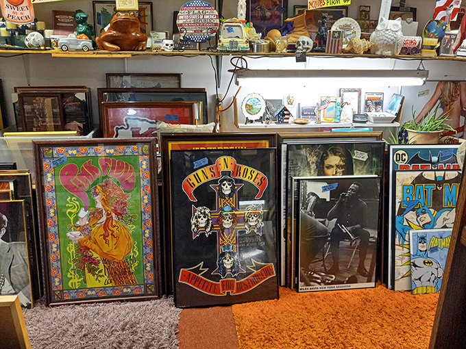 Rock 'n' roll history meets comic book heroes on this wall of framed nostalgia. Guns N' Roses next to Batman&mdash;the unexpected friendship we didn't know we needed.