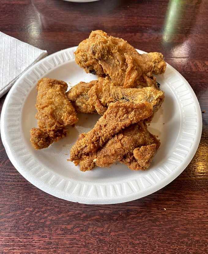 Golden-brown perfection on a paper plate&mdash;these chicken wings aren't trying to impress Instagram, they're too busy impressing your taste buds.