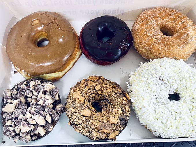 Donut diversity at its finest. From maple to chocolate to coconut—it's like the United Nations of breakfast indulgence.