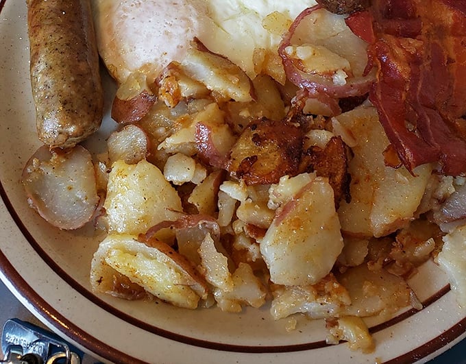 Behold the stars of the show! These legendary home fries aren't just breakfast potatoes; they're crispy-edged nuggets of morning salvation.