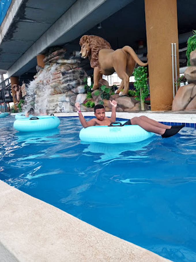 Floating in a blue inner tube while a lion watches &ndash; not a scenario I expected in Oklahoma, but one I'm thoroughly enjoying.