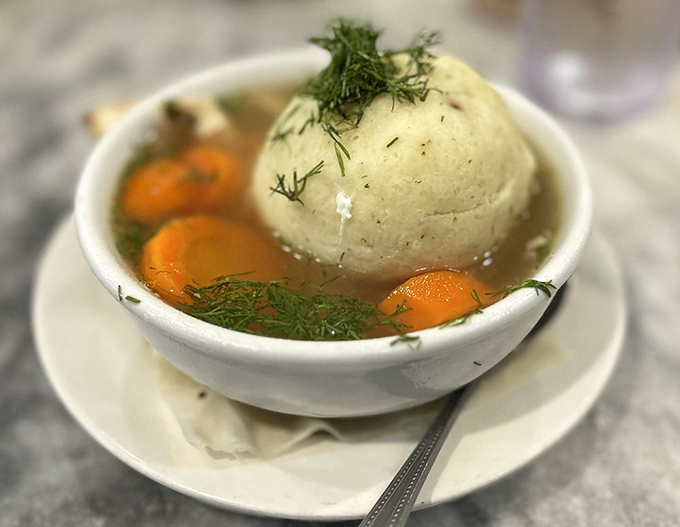 When a matzo cracker meets its soulmate: homemade soup. The crackers provide the perfect textural contrast to those velvety matzo balls