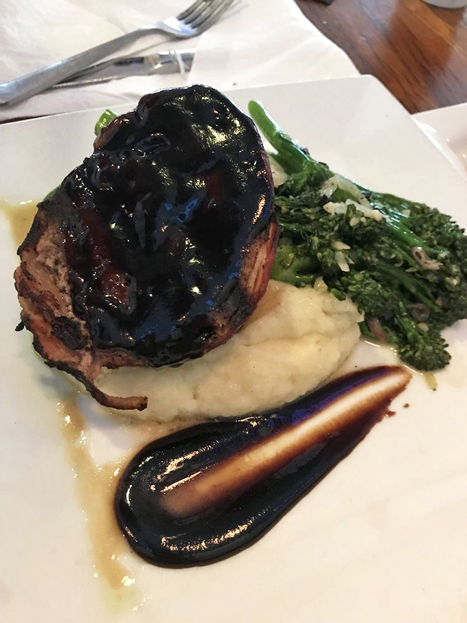 This isn't your mother's meatloaf&mdash;unless your mother was secretly a five-star chef. Glistening with glaze and perched on cloud-like mashed potatoes.