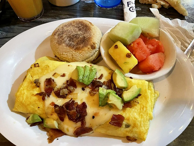 The perfect omelet doesn't exi&mdash; wait, I stand corrected. Cheese stretching for days, fresh avocado, and bacon that means business.