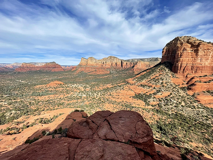 Mother Nature showing off her architectural portfolio. Those layered red cliffs make the most impressive skyscrapers look like amateur hour.