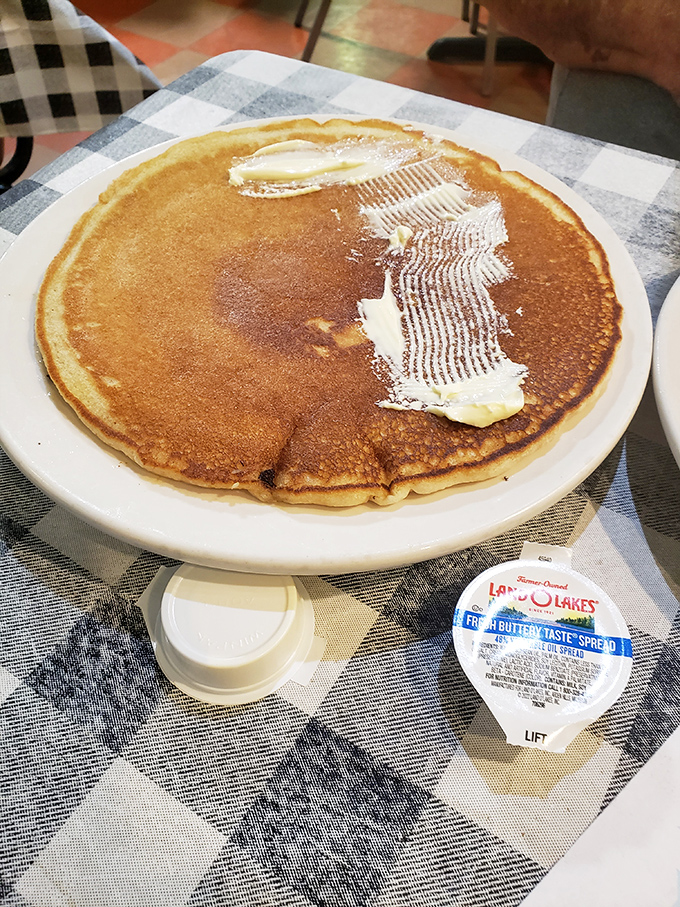 The pancake that ate Manhattan! This golden disc of joy requires its own area code and possibly building permits.