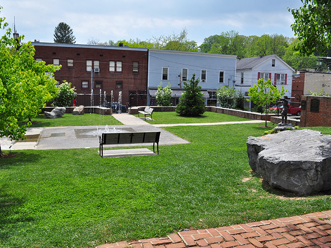 A pocket park where conversations bloom as naturally as the greenery. In small towns, these gathering spaces aren't amenities&mdash;they're essential community living rooms.