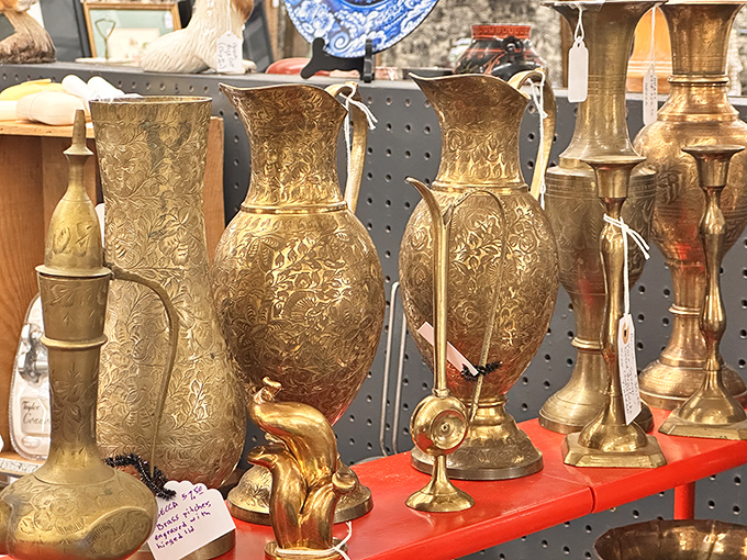 Gleaming brass vessels stand at attention like golden soldiers. Each one has probably witnessed more dinner parties than a veteran caterer.
