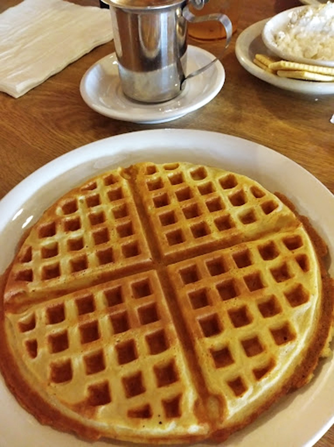 Behold the golden waffle in its natural habitat! Those perfect grid patterns aren't just for show&mdash;they're precision-engineered syrup reservoirs.
