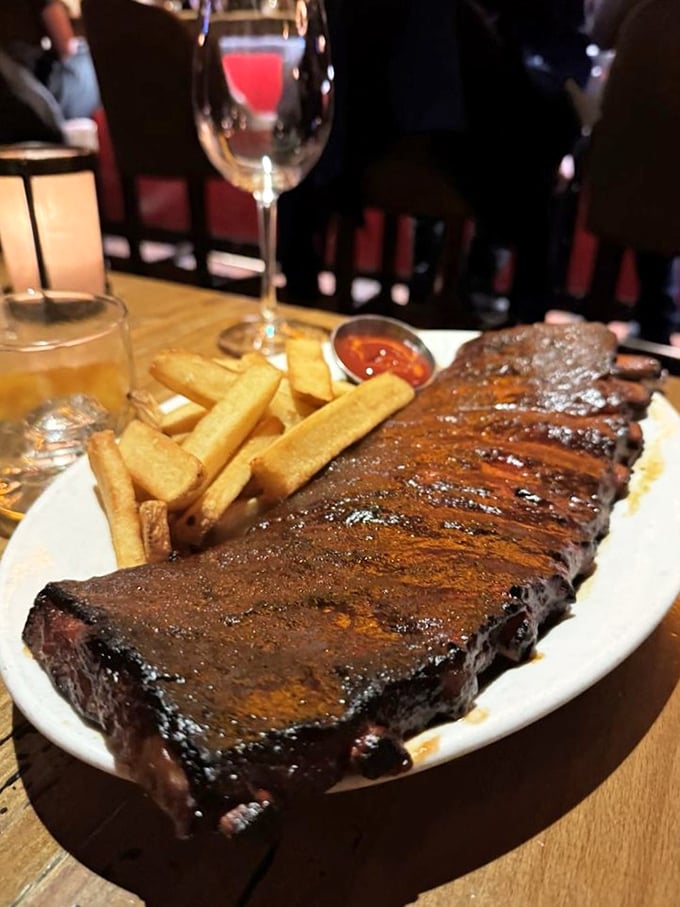 These fall-off-the-bone ribs don't just set the bar, they are the bar. Paired with golden steak fries, they're a carnivore's dream come true.