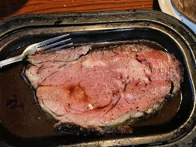 Behold the star of the show: prime rib so perfectly pink it makes vegetarians question their life choices.